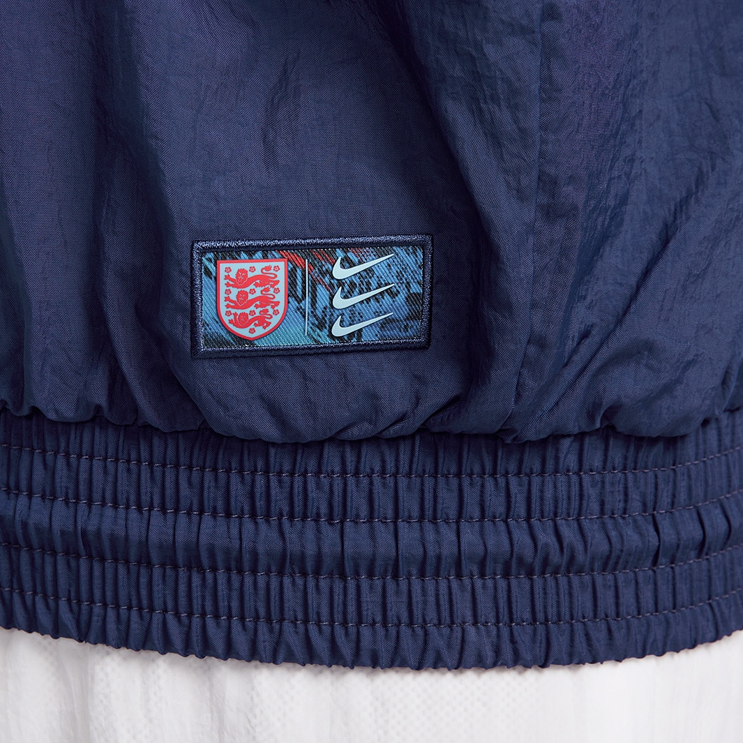 Nike England Womens 22/23 NSW Woven Jacket - Blue Void/Challenge Red ...